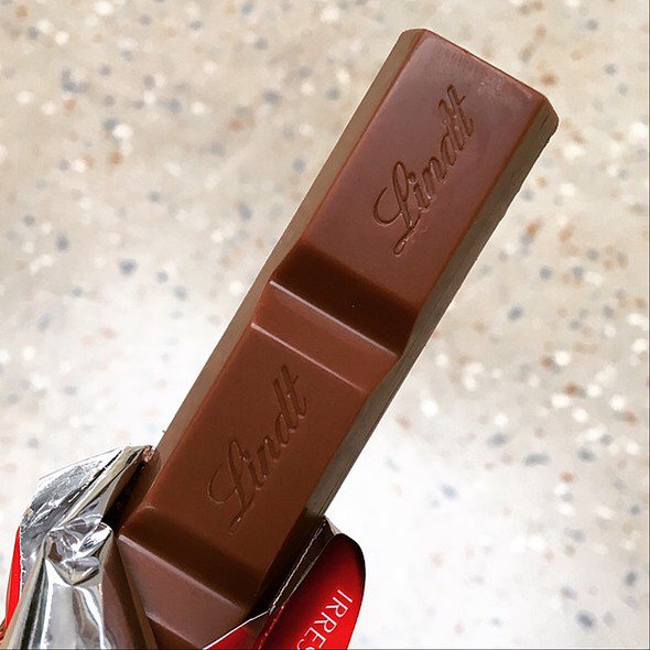 Lindt LINDOR MILK CHOCOLATE Bar Woolworths on Eaten
